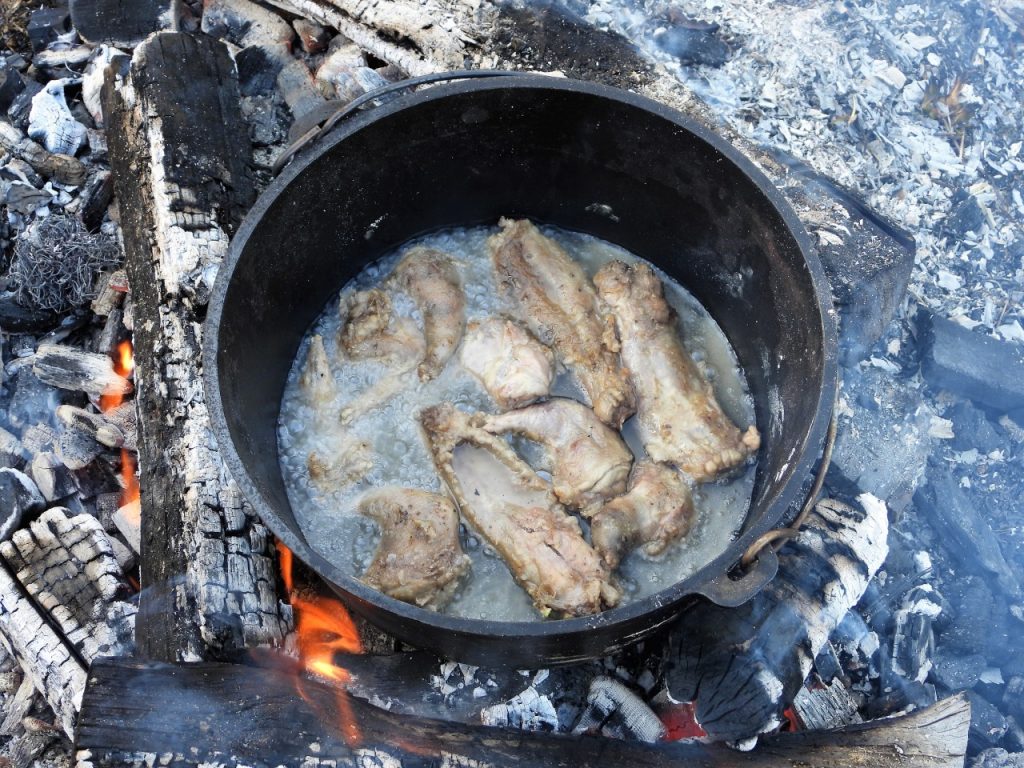 Campfire Dutch Oven Smothered Squirrel Recipe - NSSF Let's Go Hunting